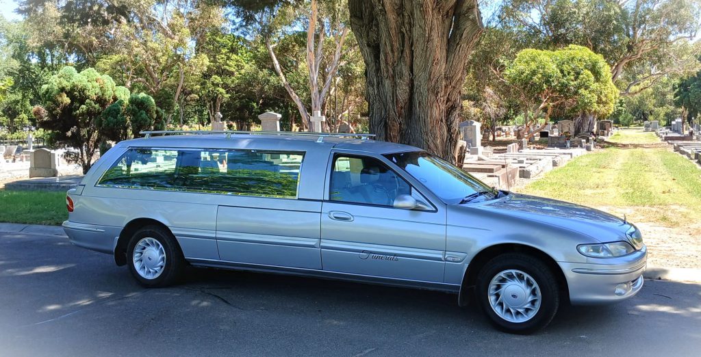 Silver Ford LTD Hearse - Specialty Funeral Services